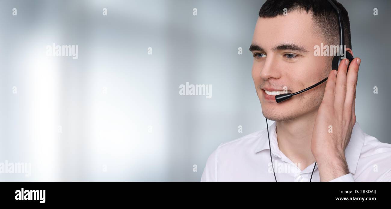 Hotline operator with headset in office, space for text. Banner design ...
