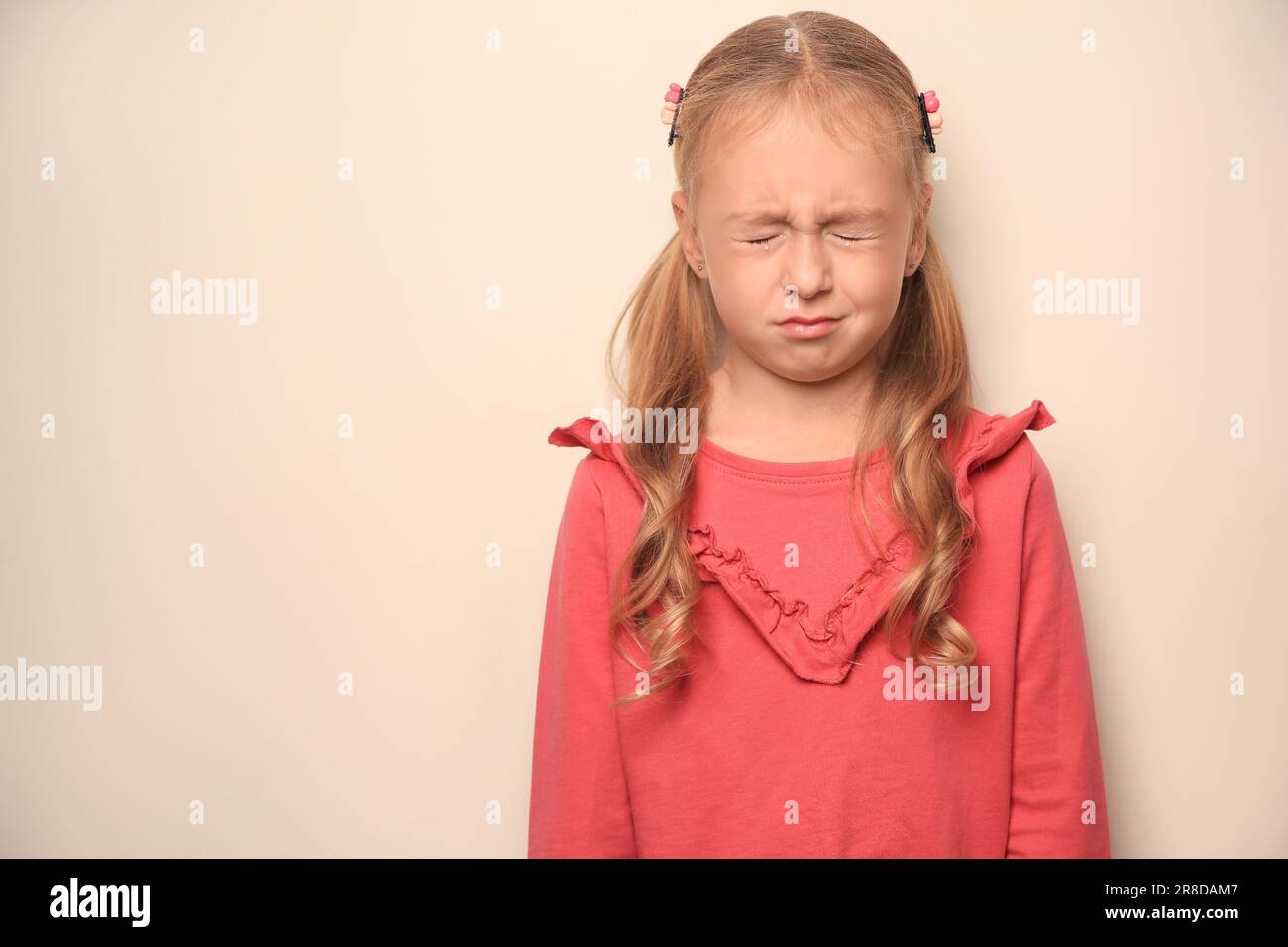 Cute little girl crying on light background. Space for text Stock Photo ...
