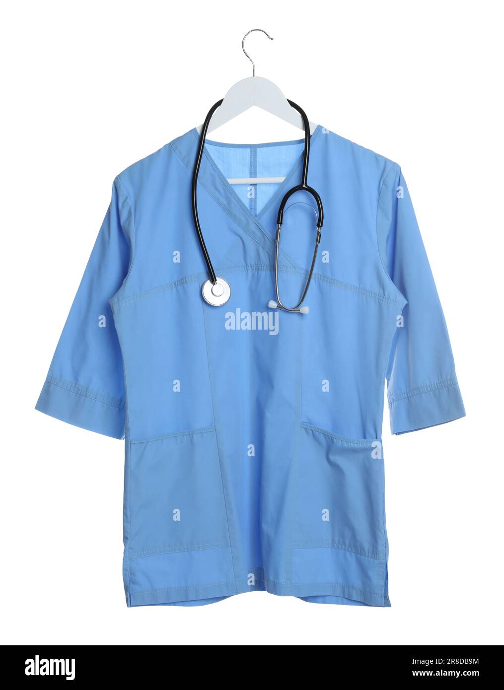 Light blue medical uniform and stethoscope on white background Stock ...
