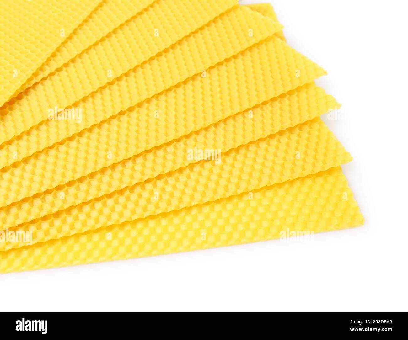 Natural organic beeswax sheets on white background Stock Photo - Alamy