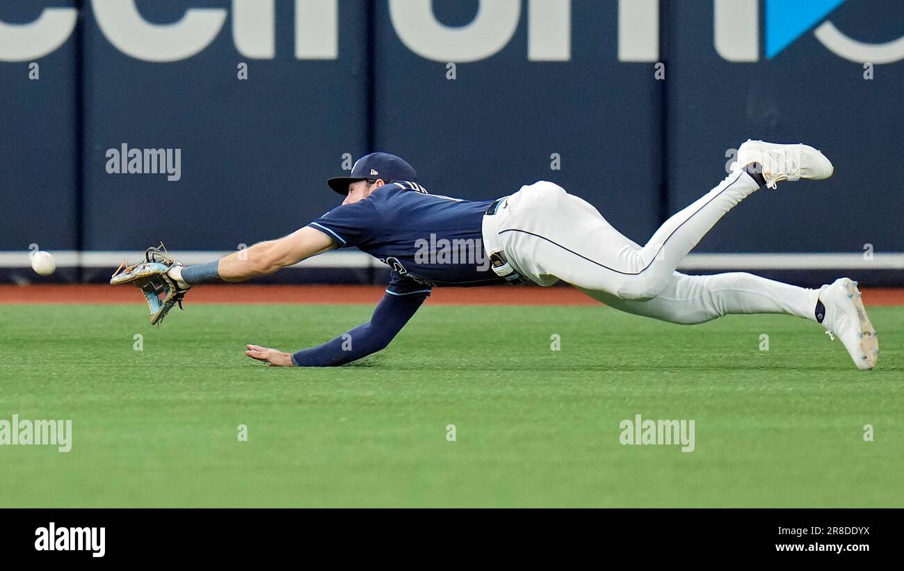 Tampa Bay Rays center fielder Josh Lowe dives but can't get to a double ...