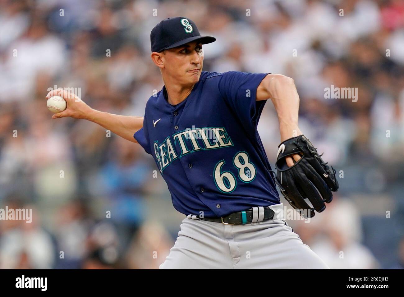 Seattle Mariners starting pitcher George Kirby (68) throws in the first ...