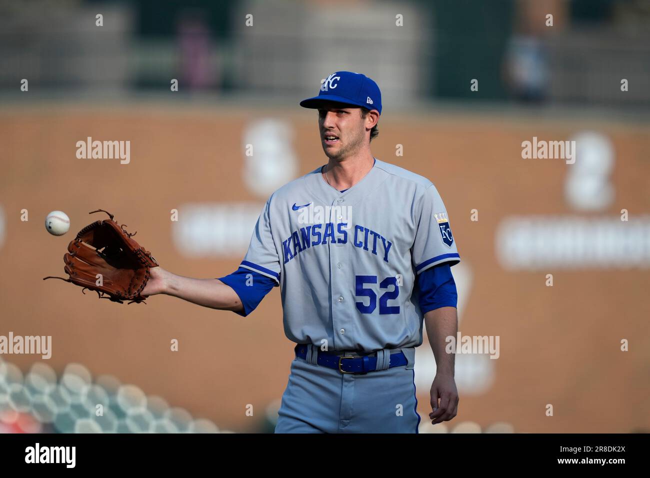 Kansas City Royals starting pitcher Daniel Lynch catches a new ball ...