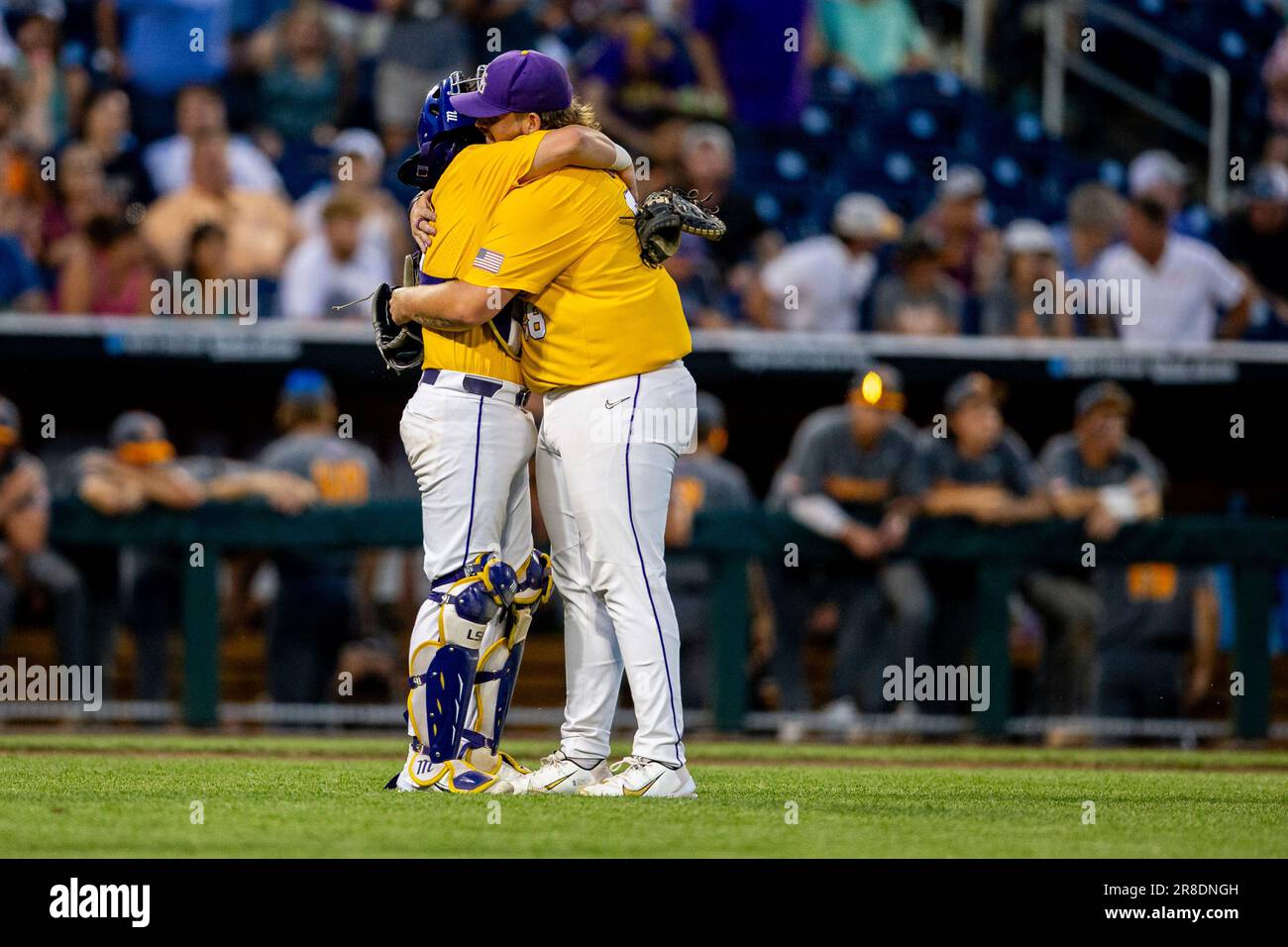 LSU pitcher Riley Cooper, right, hugs catcher Alex Milazzo after the team's win over Tennessee ...