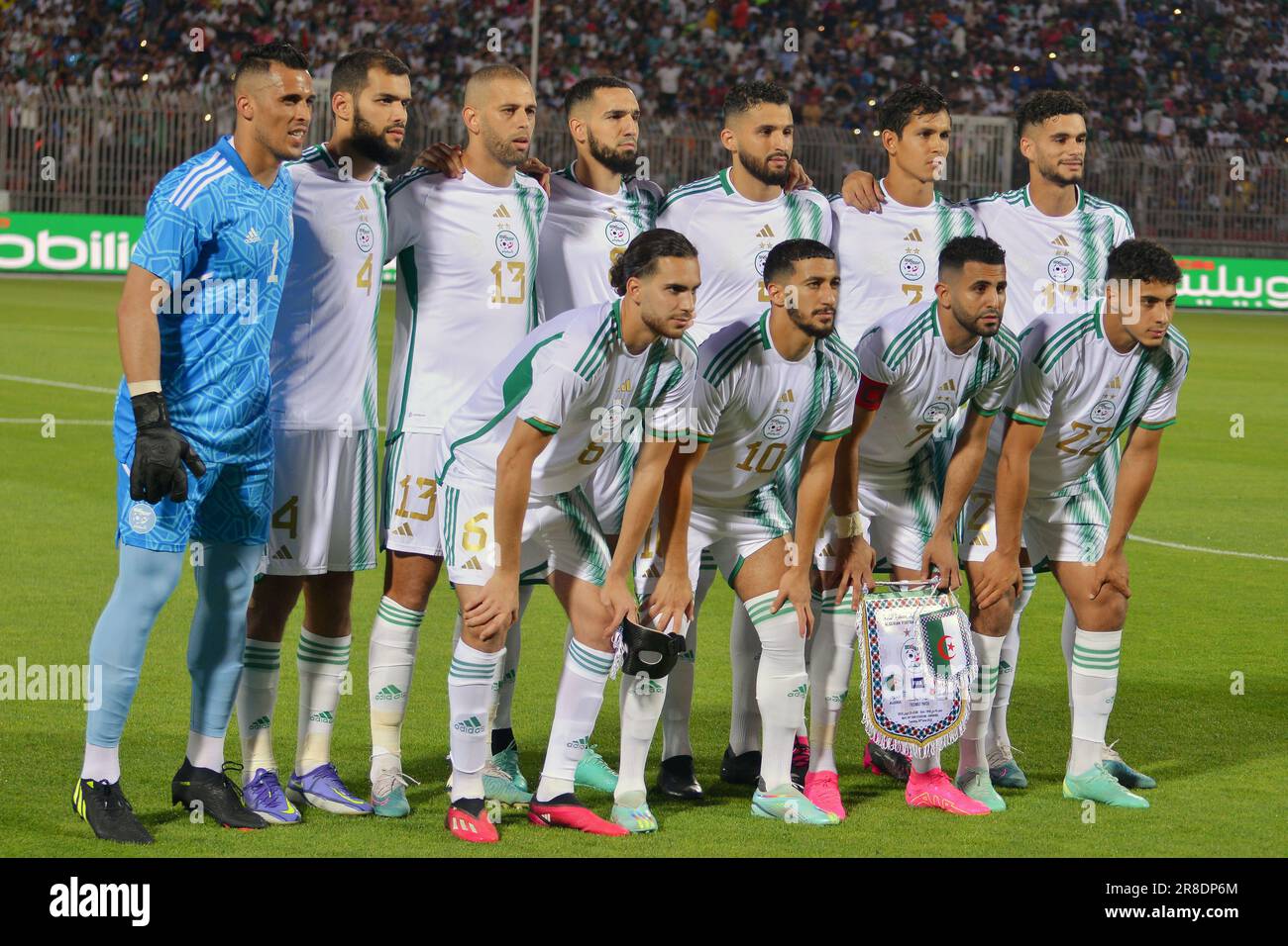 Annaba. 21st June, 2023. Algeria's starters pose for a group photo before a friendly match ...