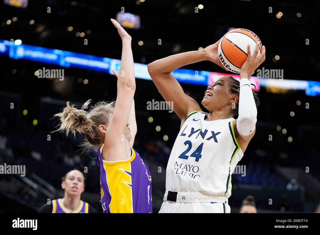 Minnesota Lynx forward Napheesa Collier, right, shoots as Los Angeles ...