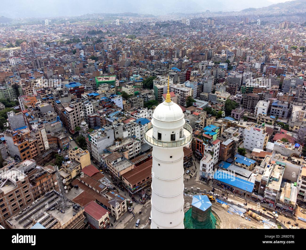 An aerial view of the city of Kathmandu, Nepal on a cloudy day with the ...