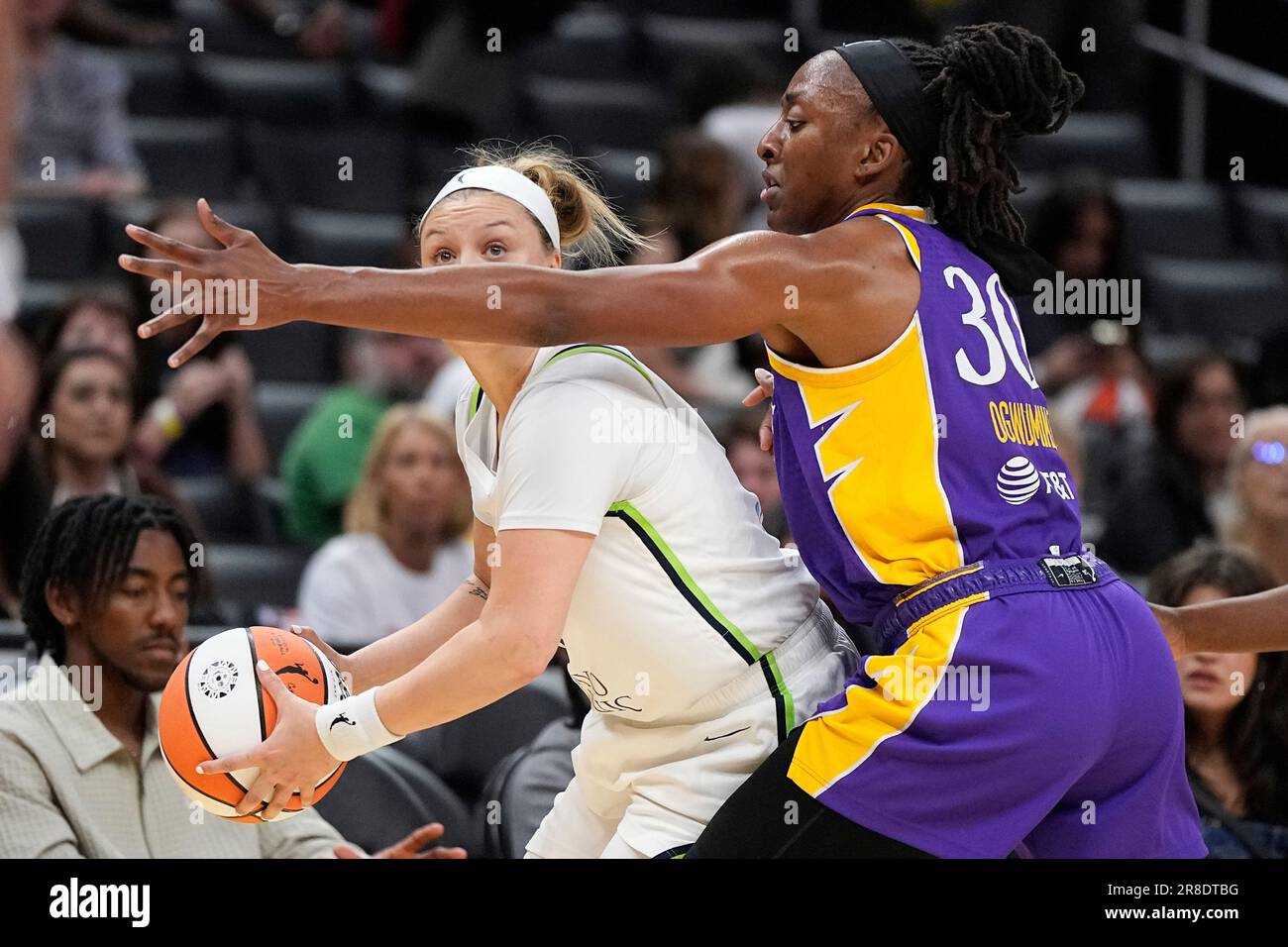 Minnesota Lynx guard Rachel Banham, left, tries to pass while under ...