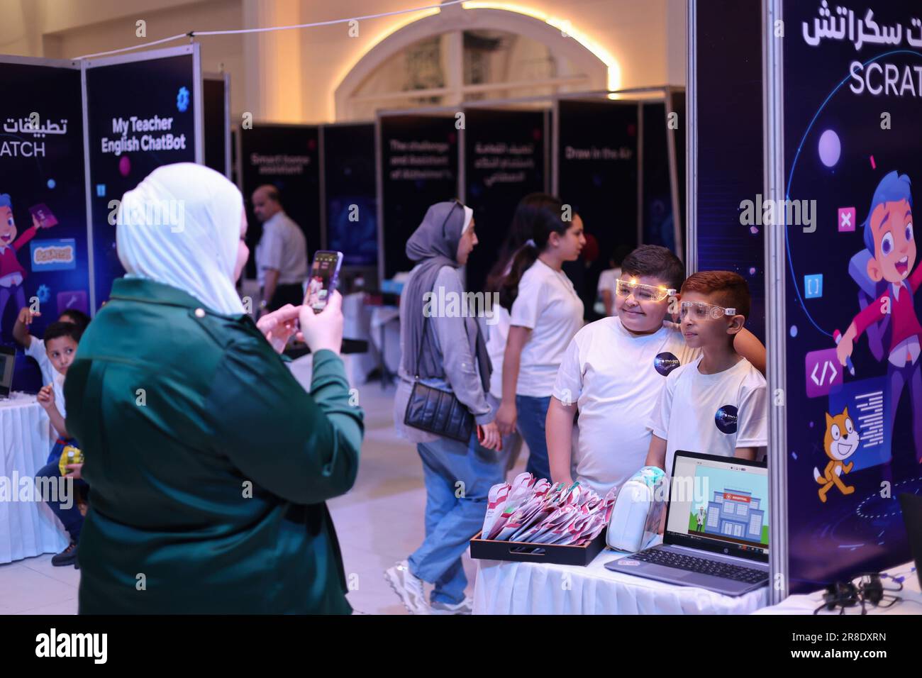 Gaza, Palestine. 20th June, 2023. A Palestinian woman takes photos with ...