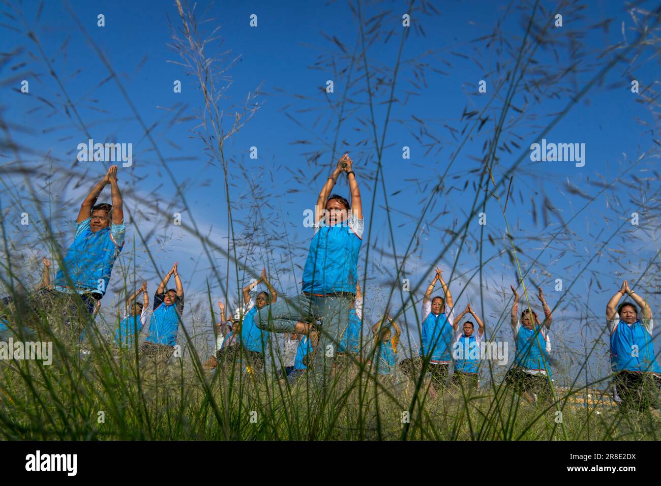 People perform yoga on International Day of Yoga in Kathmandu, Nepal ...