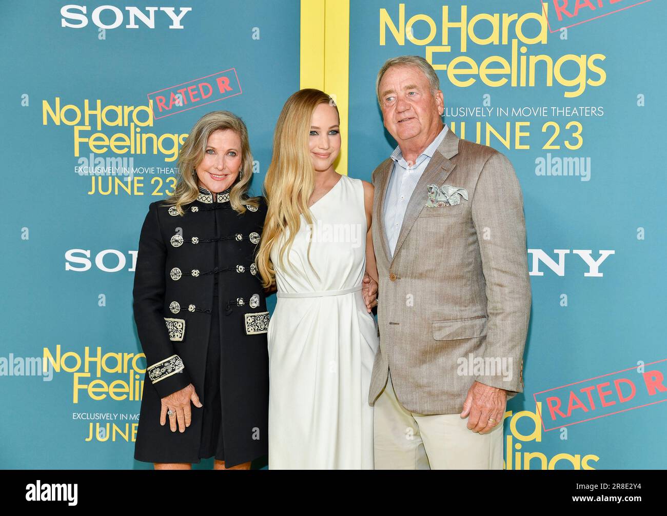 Jennifer Lawrence, center, poses with parents Karen Lawrence and Gary ...