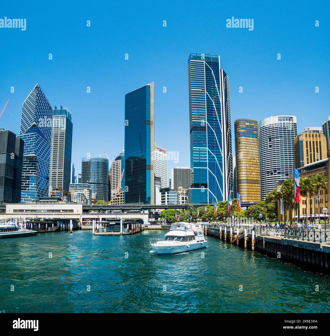Australia, NSW, Sydney, Boat in harbour and modern waterfront ...