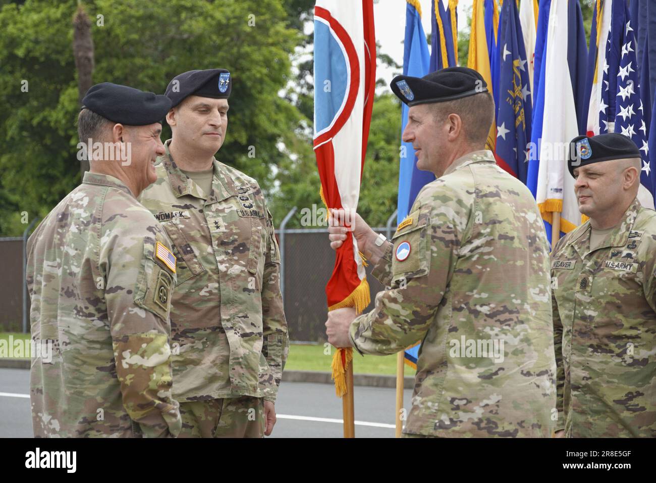 Maj. Gen. Dave Womack (2nd from L) attends a change-of-command ceremony ...