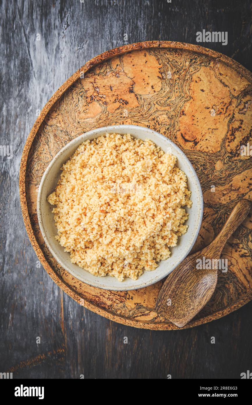 Freshly cooked bulgur in bowl. Bulgur wheat grains Stock Photo - Alamy