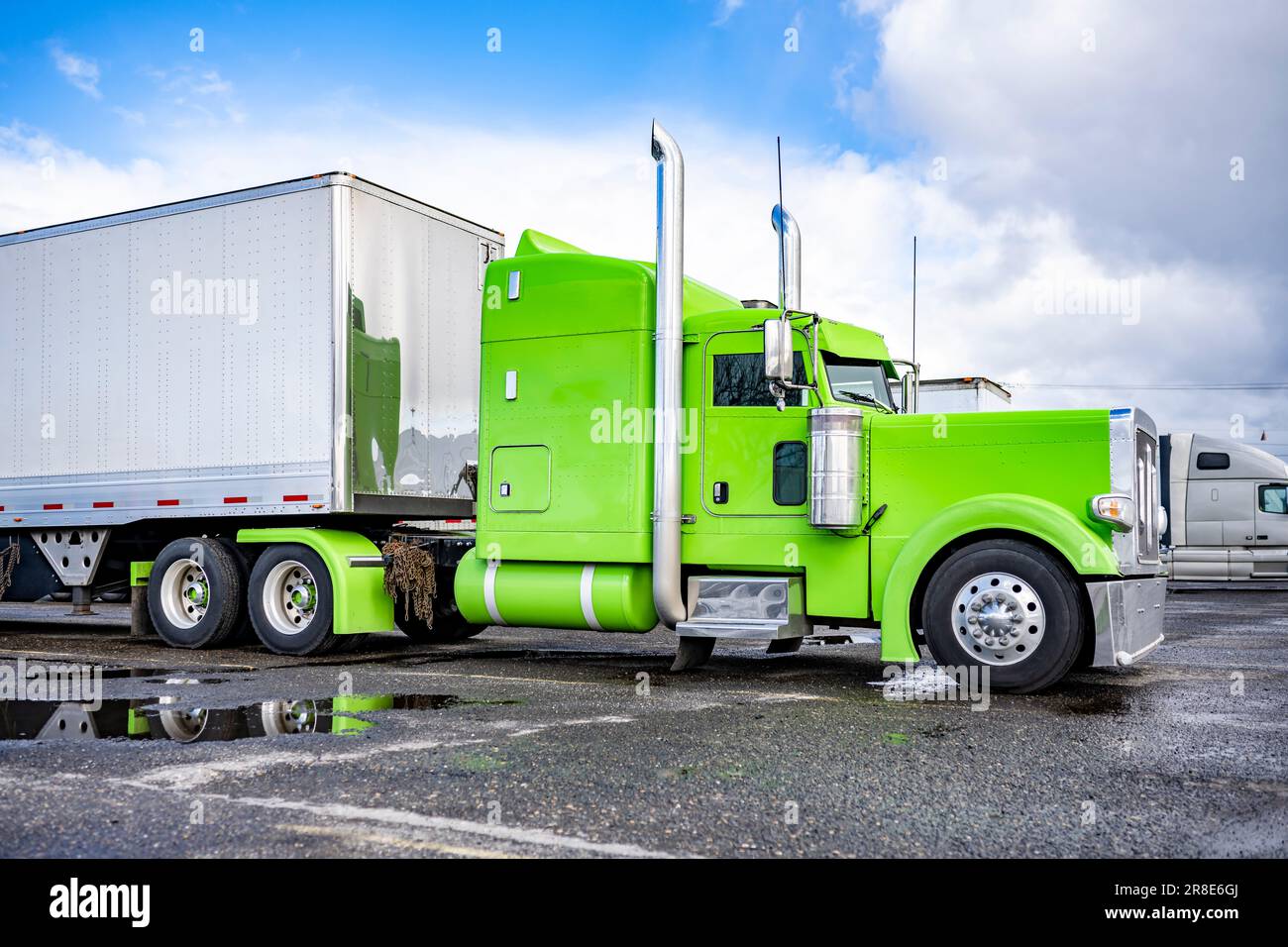 Green big rig classic American bonnet semi truck tractor with extended ...