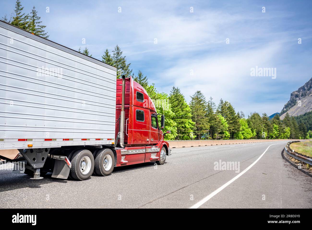 Red industrial big rig bonnet semi truck tractor with high cab ...