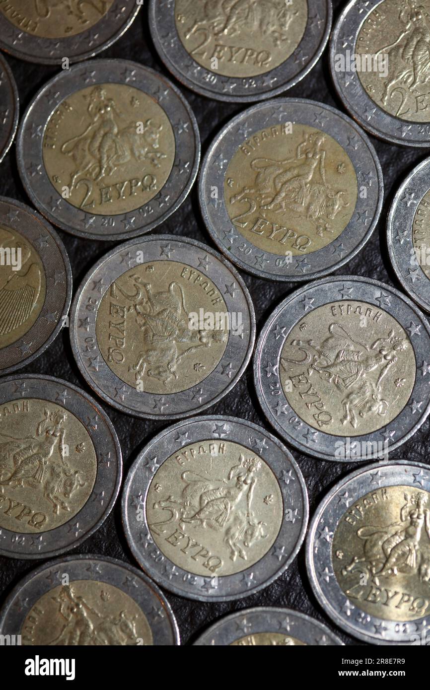 Lot of 2 euro coins close up image financial background european money ...