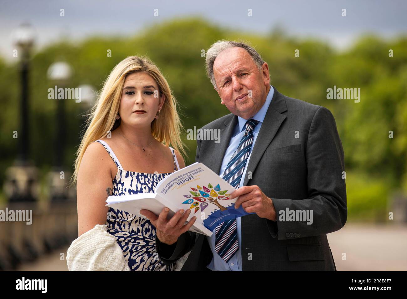 Professor Ray Jones (left), holding the Northern Ireland review of ...