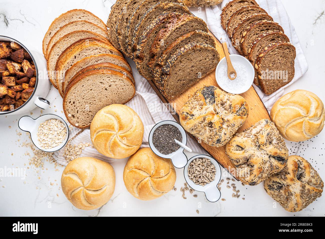 Assortment of different kind of cereal bakery - bread, pasties, buns ...