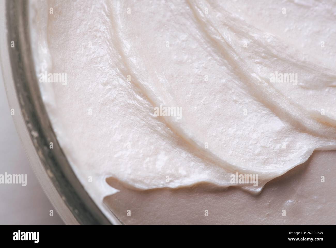 Background with texture of pearl cream in a jar Stock Photo - Alamy