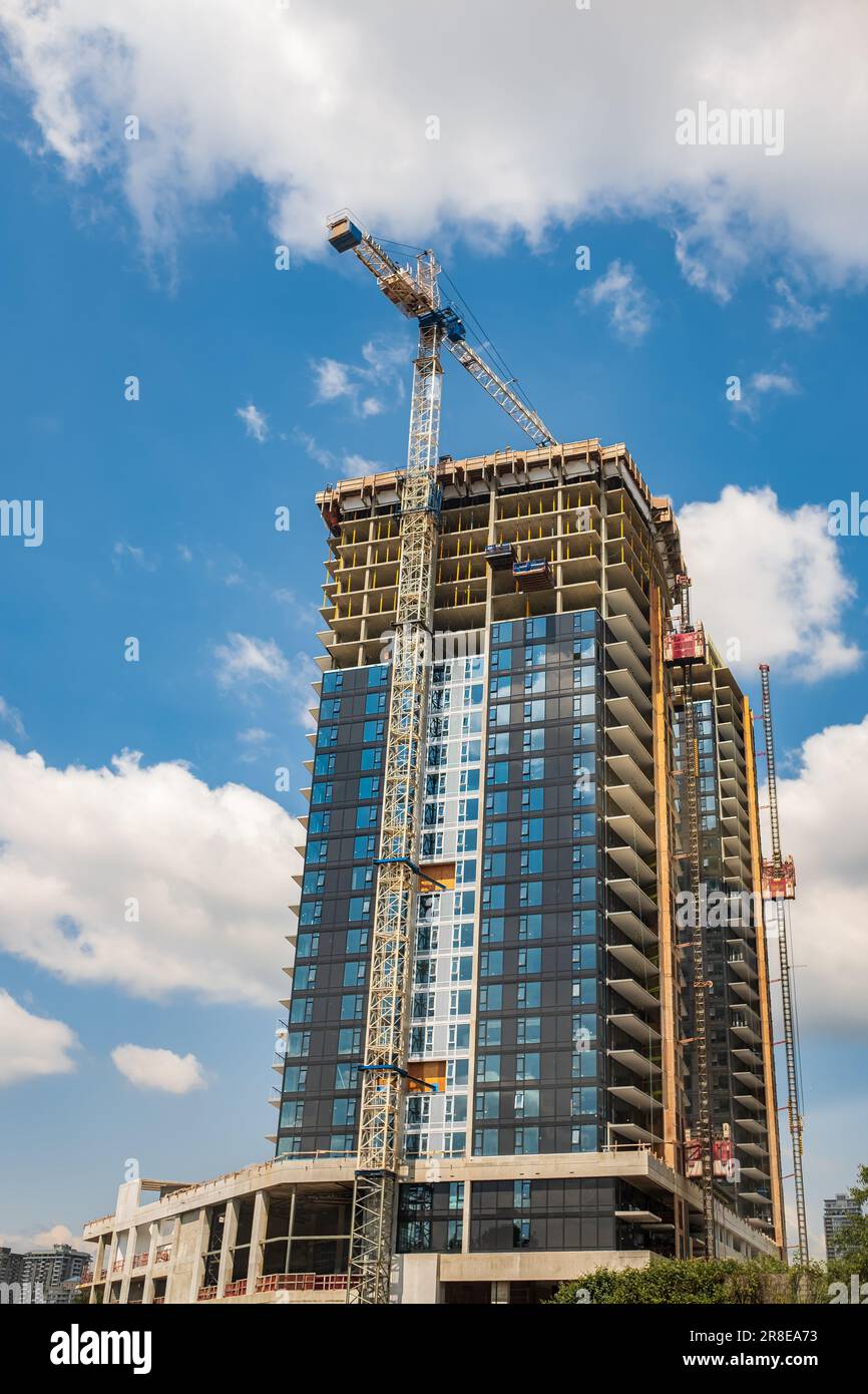 Building site with cranes new development in the city. Concrete high ...