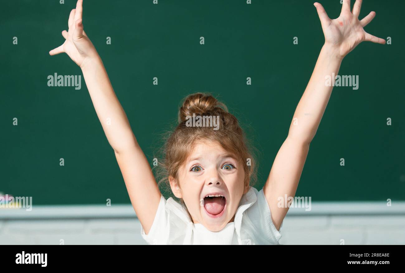 Excited face schoolgirl copy hi-res stock photography and images - Alamy
