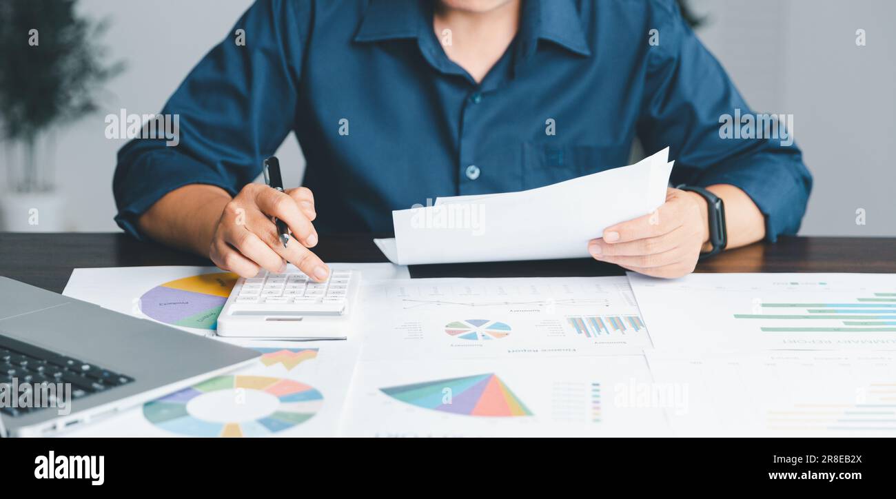 Young woman of banking finance officer using computer laptop and use ...