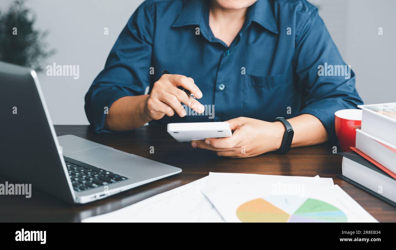 Young woman of banking finance officer using computer laptop and use ...