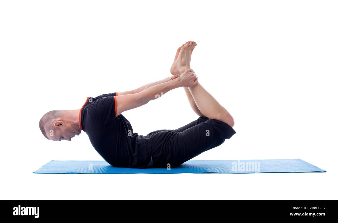 Image of flexible yogi posing in difficult asana Stock Photo - Alamy