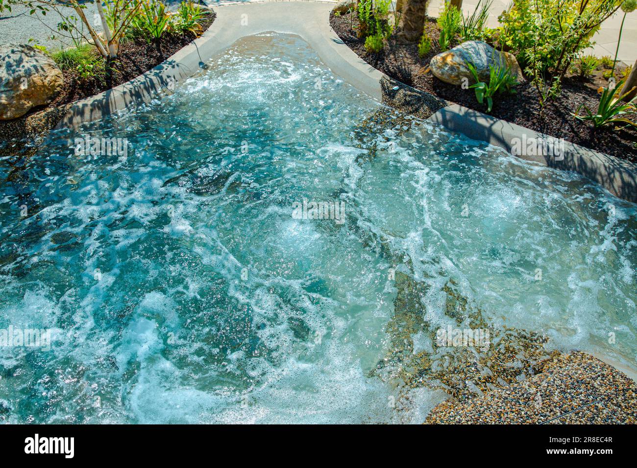 Natural swimming pond or natural spa jacuzzi for a small garden Stock ...