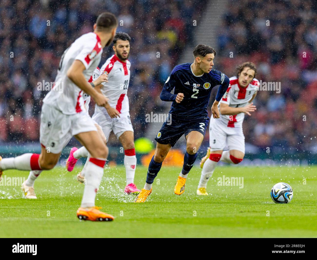 Glasgow, UK. 20th June, 2023. Aaron Hickey of Scotland gets away from ...