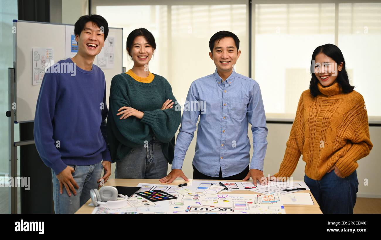 Image of professional developer team standing at co working space and ...