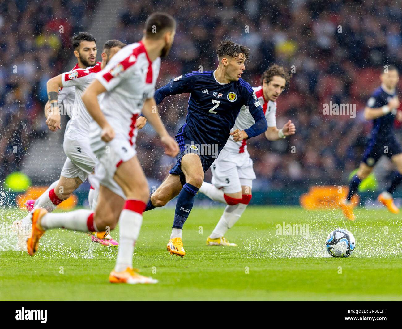 Glasgow, UK. 20th June, 2023. Aaron Hickey of Scotland gets away from ...