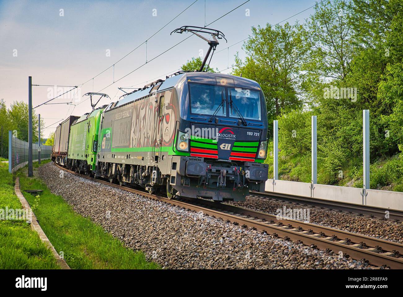 A train moving along the tracks Stock Photo - Alamy