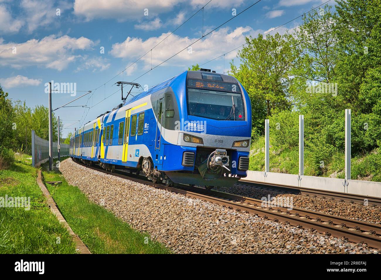 A train moving along the tracks Stock Photo - Alamy