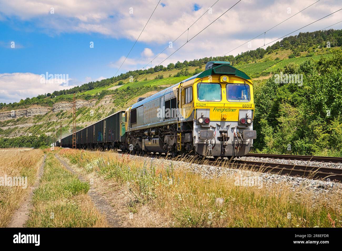 A train moving along the tracks Stock Photo - Alamy