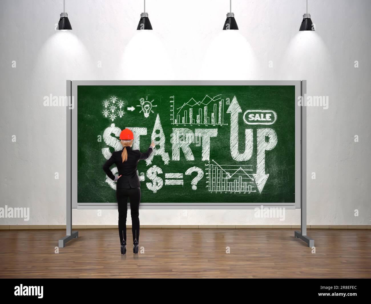 engineer woman drawing start up concept on chalk board Stock Photo - Alamy