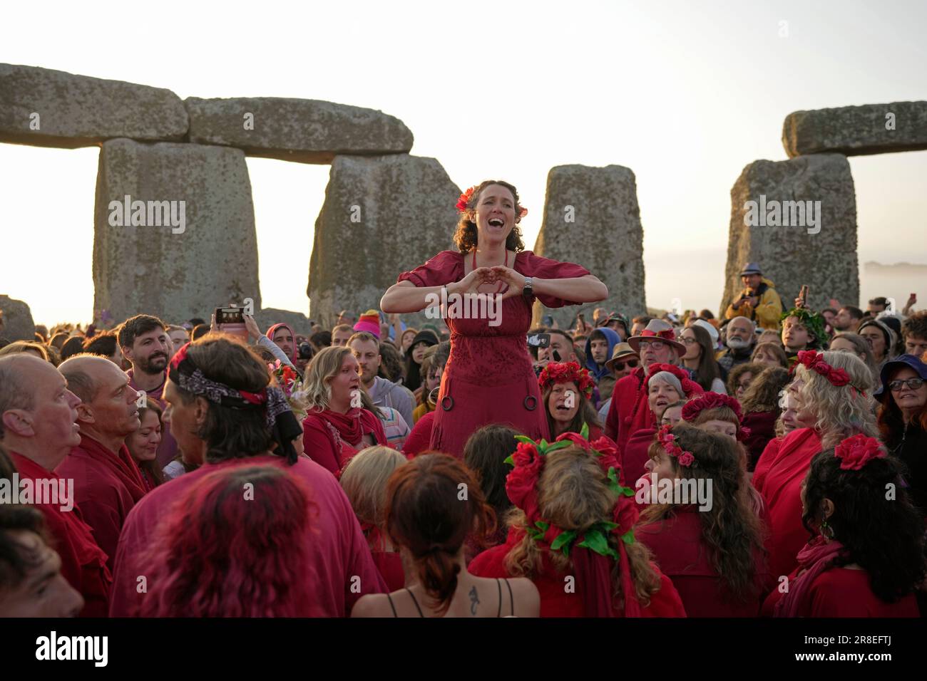 Revelers gather at the ancient stone circle Stonehenge to celebrate the ...