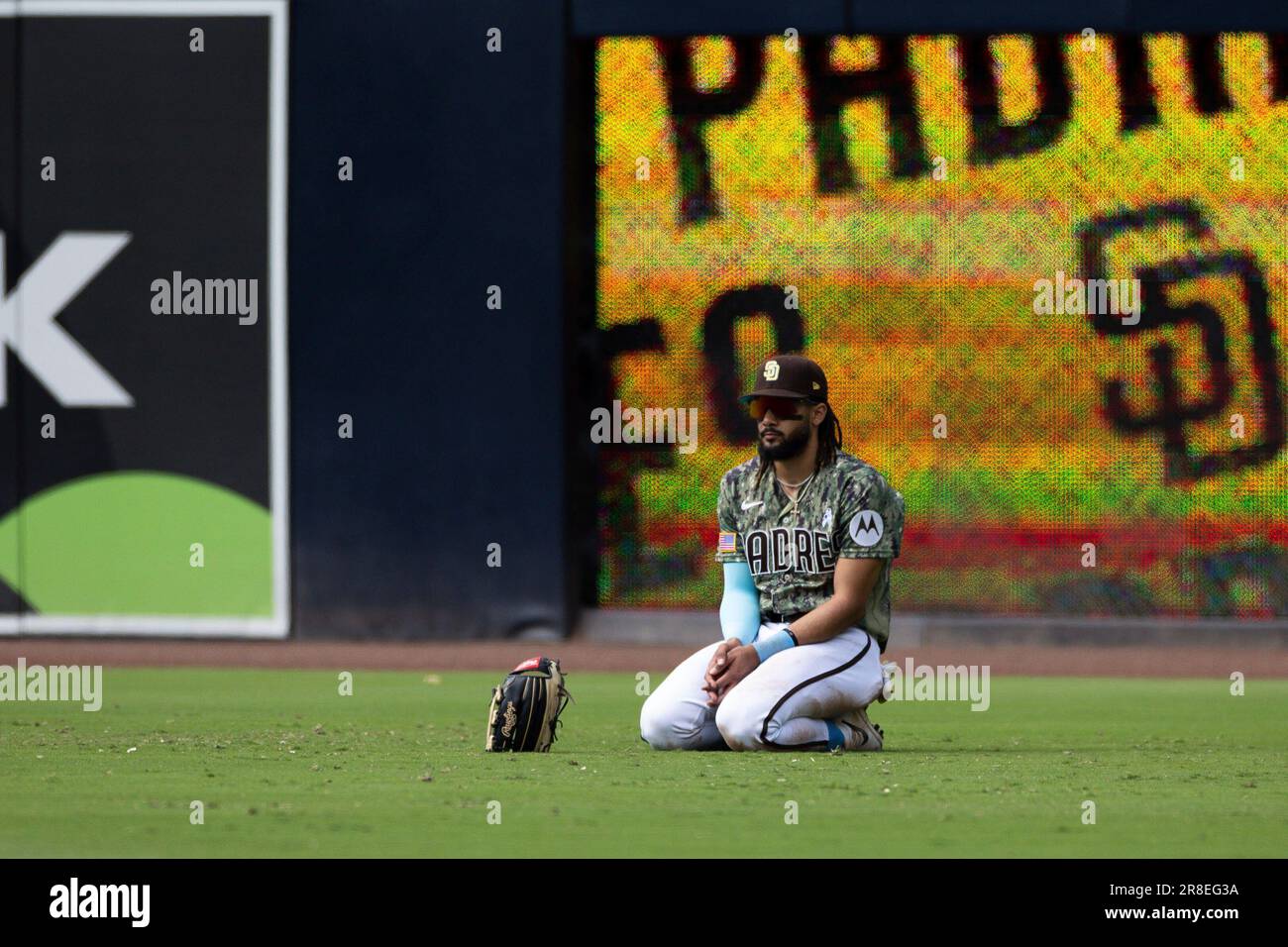 San Diego Padres right fielder Fernando Tatis Jr. kneels on the field ...