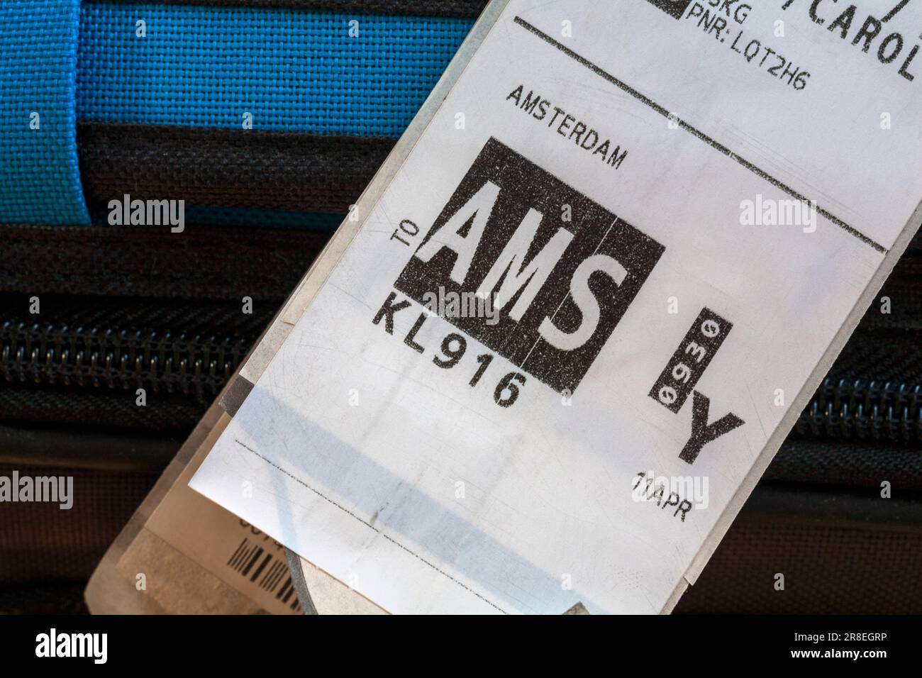 KLM Royal Dutch Airlines luggage label stuck on case for AMS Amsterdam ...