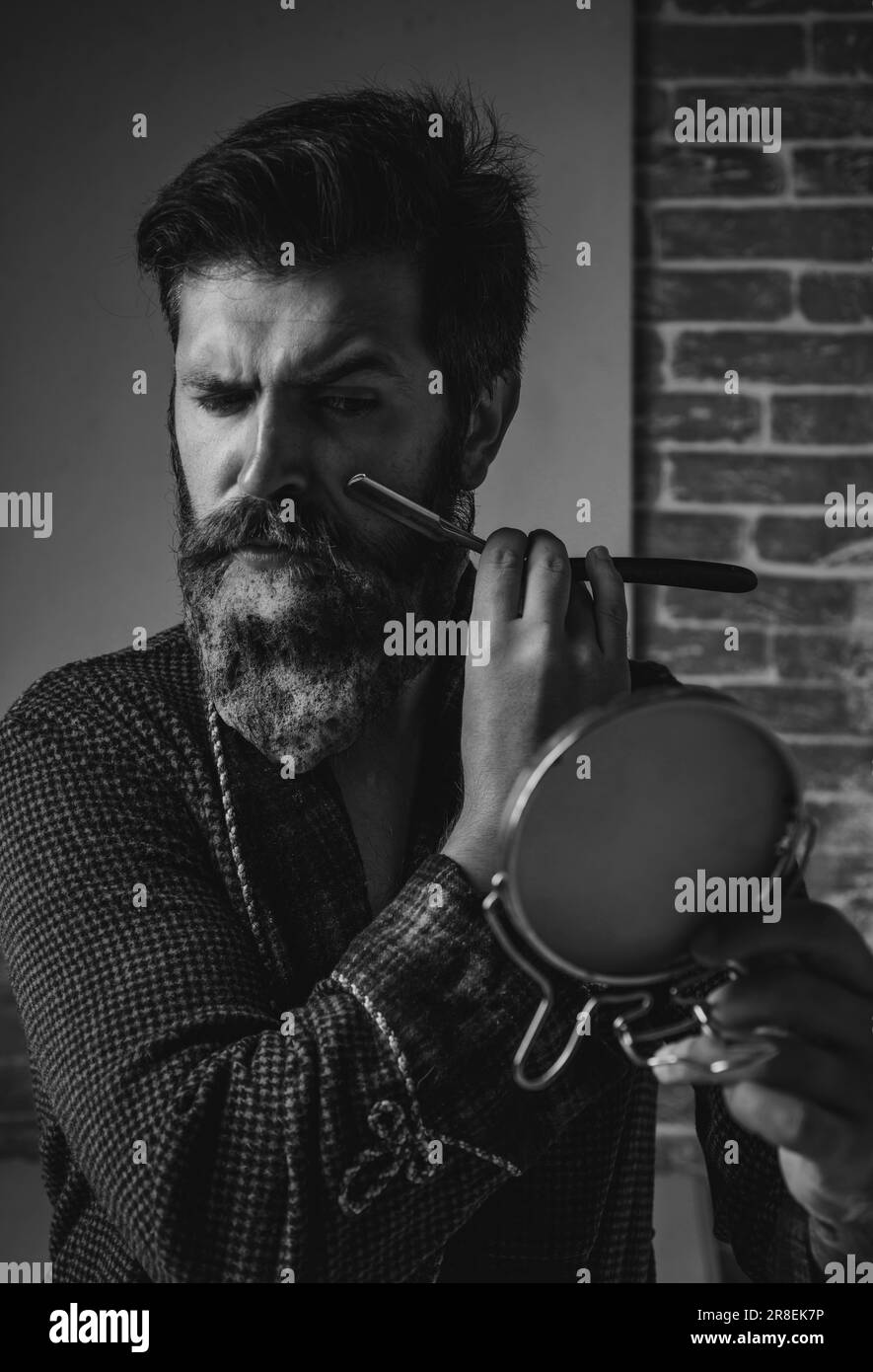 Making haircut look perfect in barber shop. Fine Cuts. Professional ...