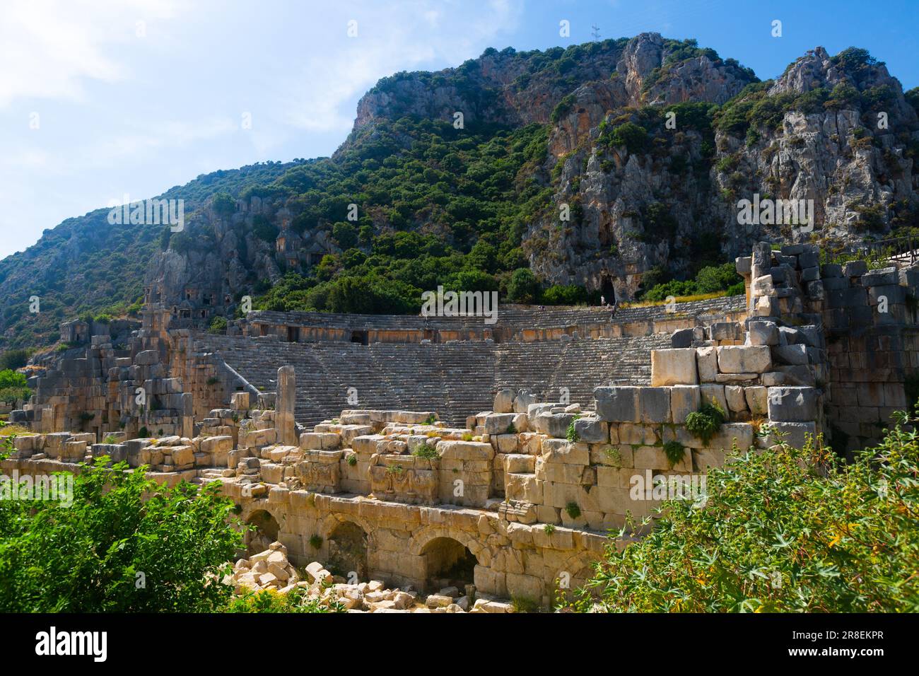 Remains of Roman theater in ancient Lycian settlement of Myra at foot of rocky mountain Stock ...