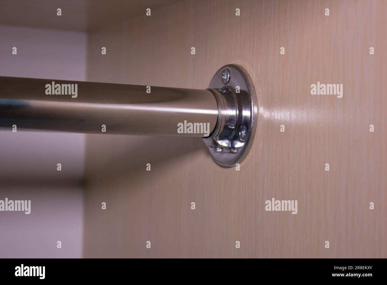 empty pipe in the closet without clothes Stock Photo - Alamy