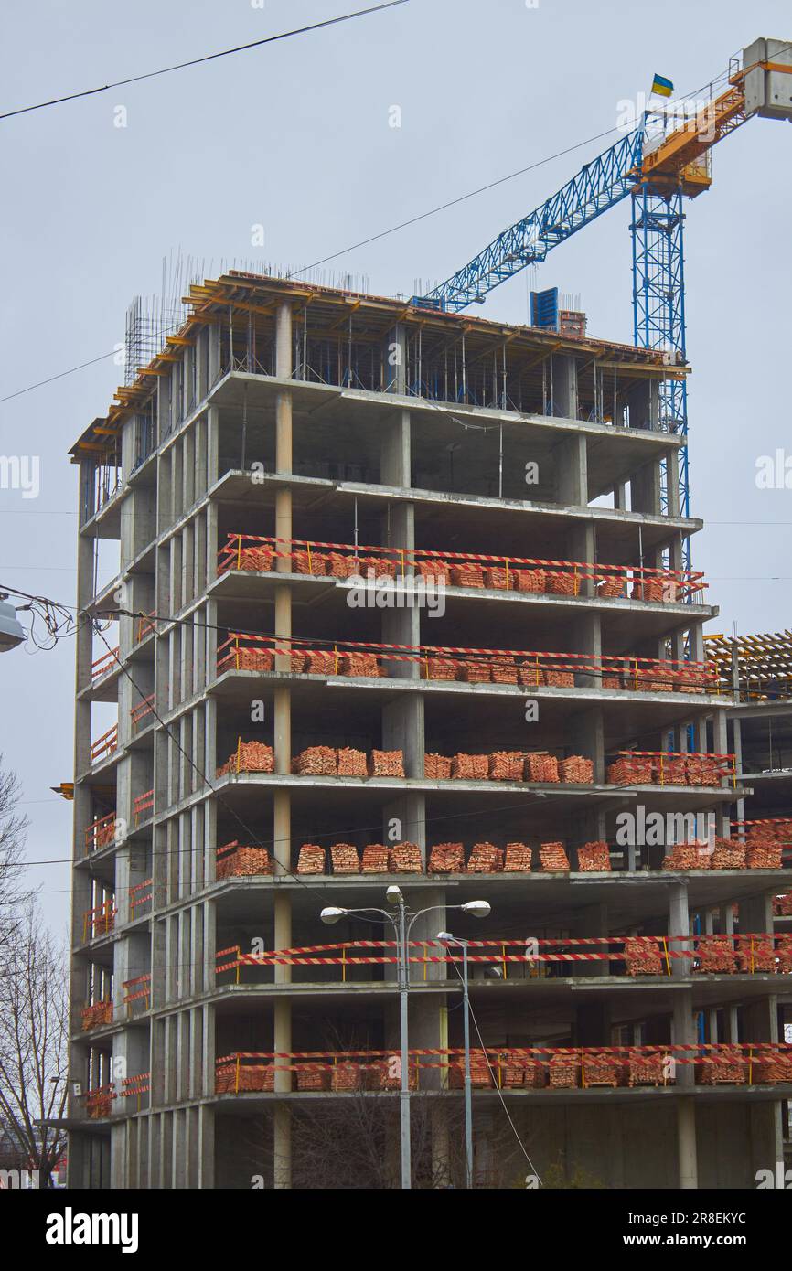 commercial building is being built in cloudy weather Stock Photo - Alamy