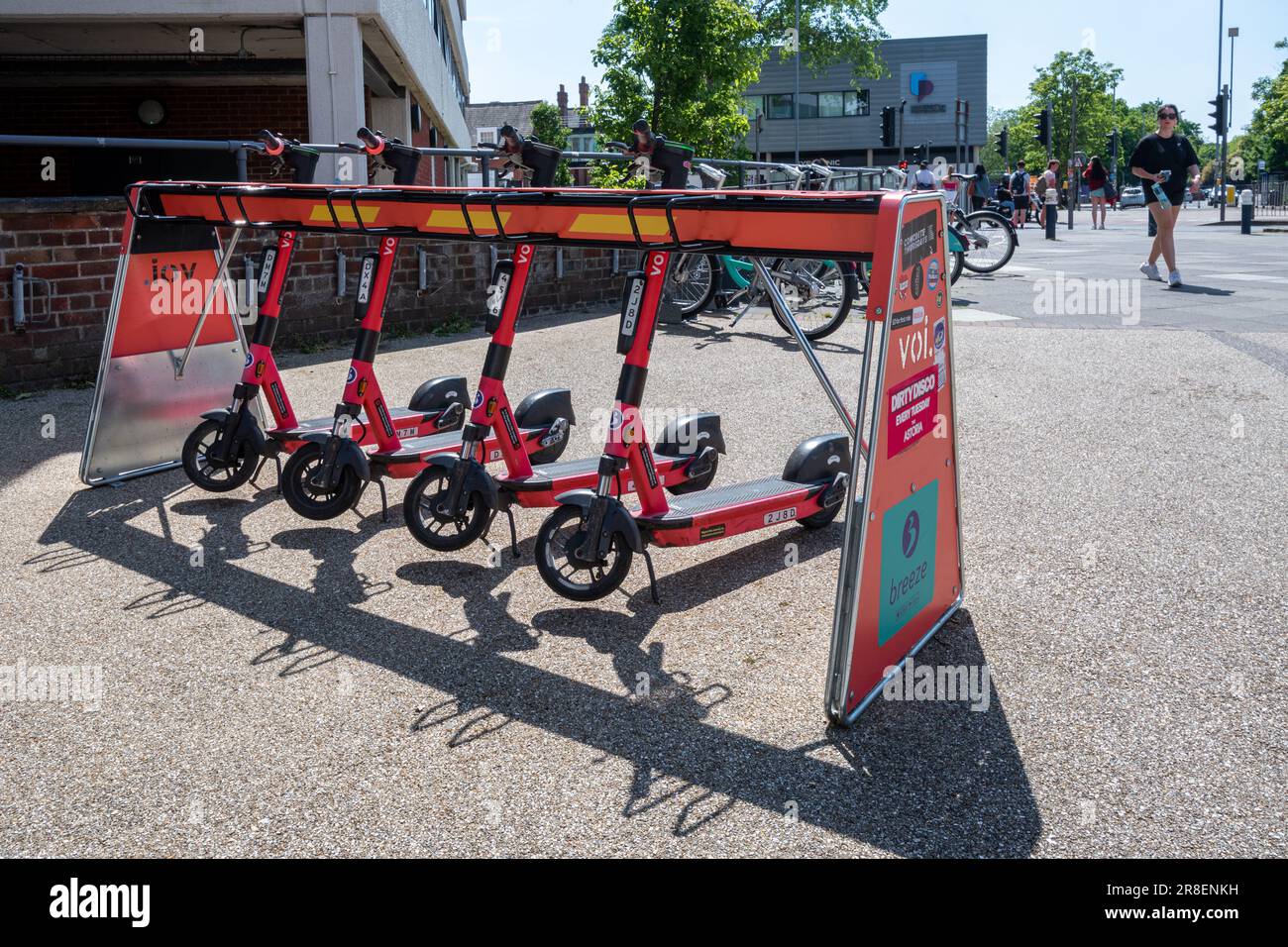 Rack of electric scooters for hire, environmentally friendly transport ...