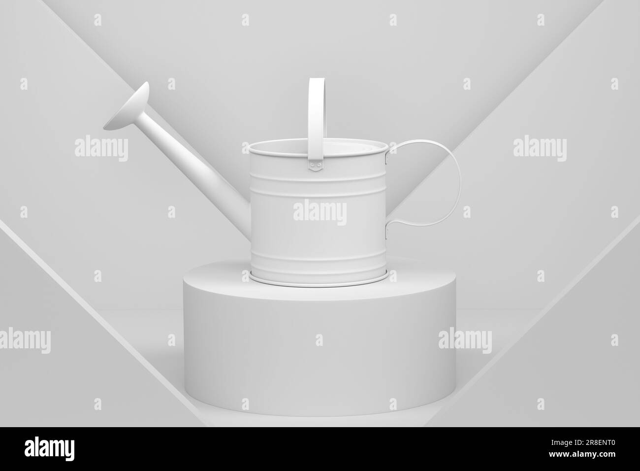 Watering can on cylinder podium with step on monochrome Stock Photo - Alamy