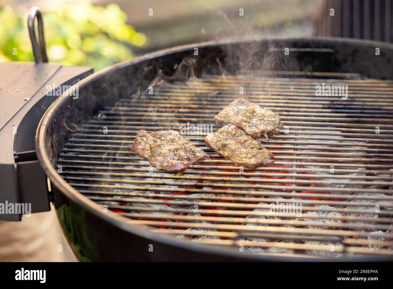 Cooking on fire pit backyard hi-res stock photography and images - Alamy