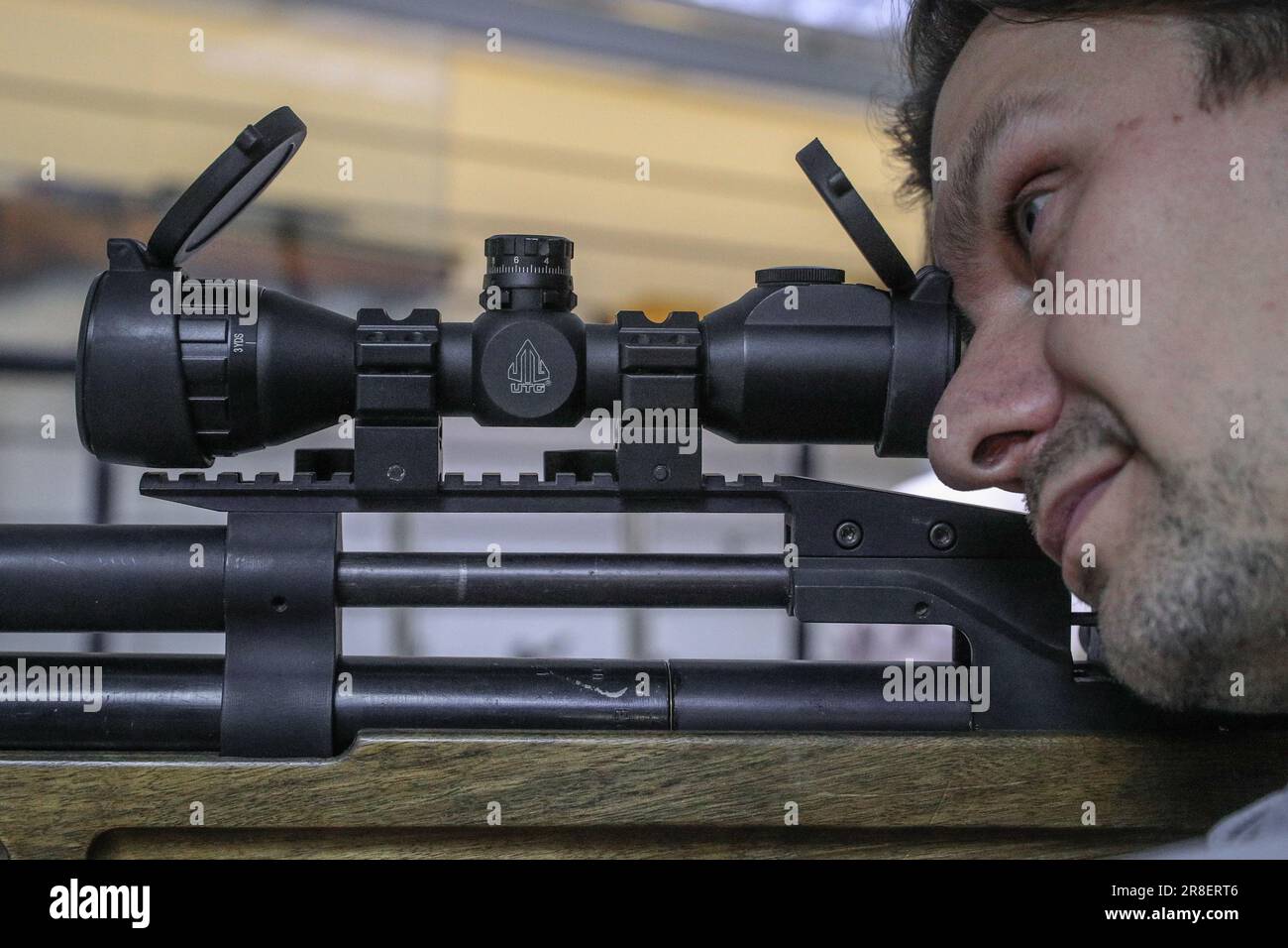 16.06.2023. Russia. Moscow. A customer at the AIR-GUN gun store Stock ...