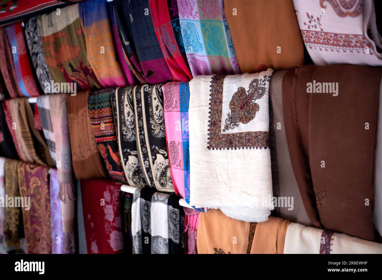 Bedouin stalls with colorful traditional textile scarf souvenirs in ...