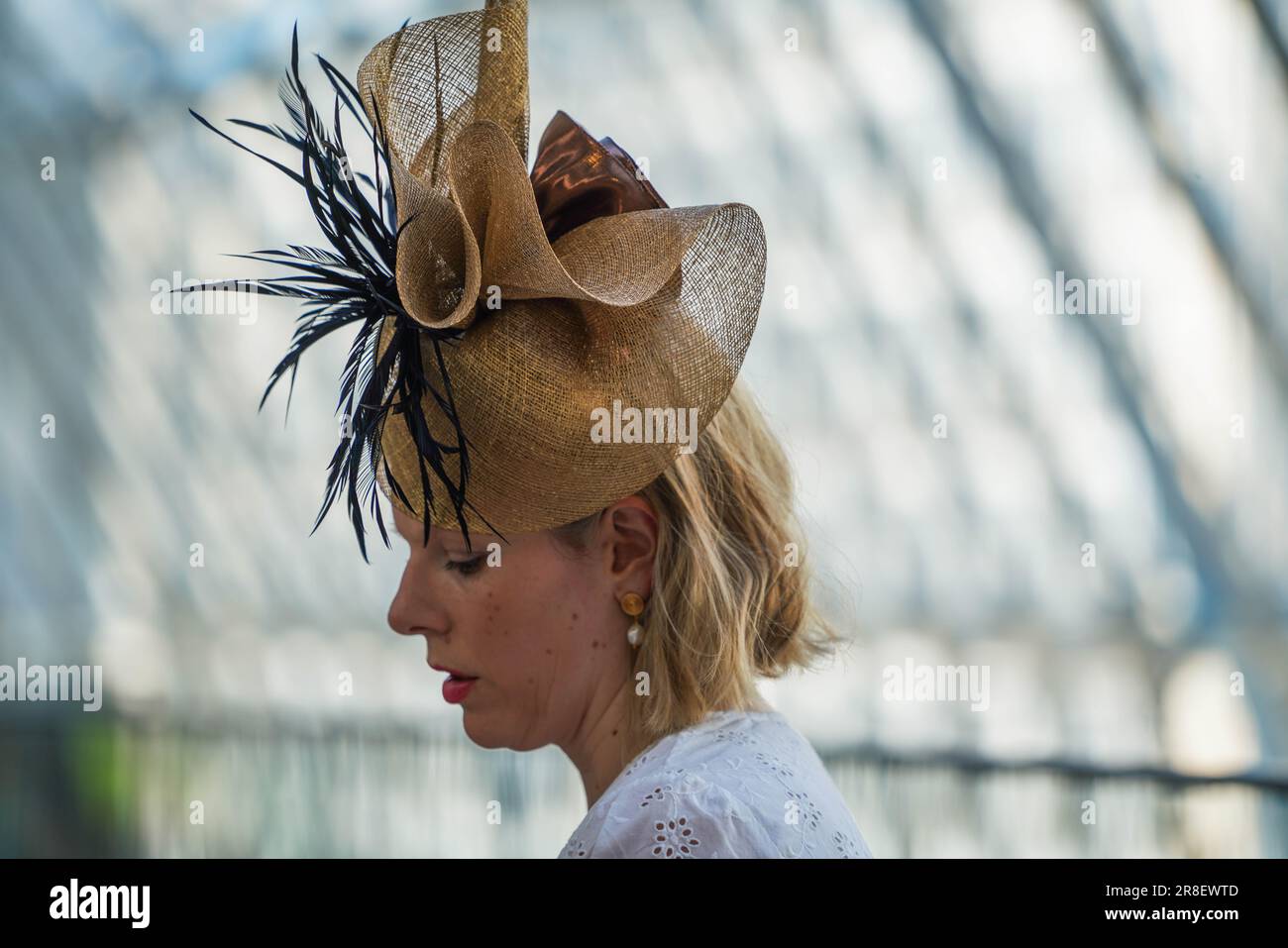 London UK. 21 June 2023 Royal ascot racegoers wearing extravagant hats ...